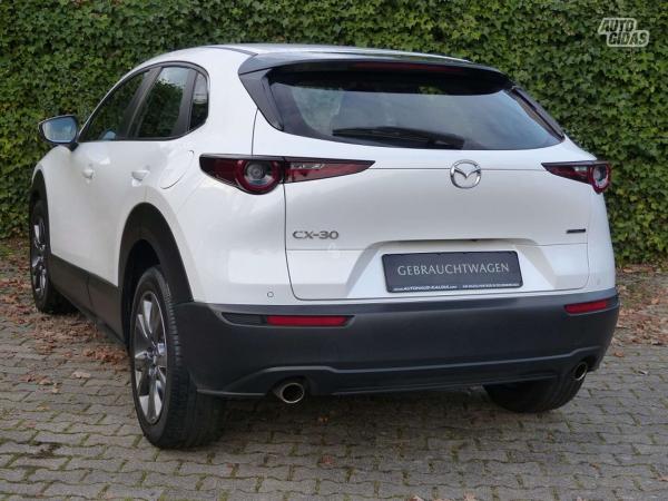 White Mazda CX-30 2020 in Kaunas, with an engine capacity of 2.00 L and mileage of 67 thousand km for 21937 €, photo 5 on AUTOMOTO.COM.LV