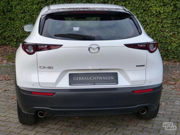 White Mazda CX-30 2020 in Kaunas, with an engine capacity of 2.00 L and mileage of 67 thousand km for 21937 €, photo 6 on AUTOMOTO.COM.LV