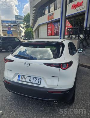 Белый Мазда CX-30 2020 в Кулдига, объемом двигателя 2.00 л и пробегом 95 тыс. км за 15500 €, фото  на AUTOMOTO.COM.LV