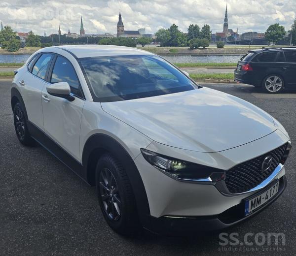 White Mazda CX-30 2020 in Kuldiga, with an engine capacity of 2.00 L and mileage of 95 thousand km for 15500 €, photo 5 on AUTOMOTO.COM.LV