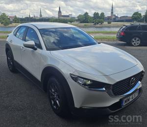 White Mazda CX-30 2020 in Kuldiga, with an engine capacity of 2.00 L and mileage of 95 thousand km for 15500 €, photo 6 on AUTOMOTO.COM.LV