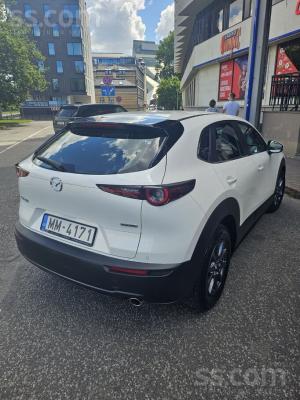 White Mazda CX-30 2020 in Kuldiga, with an engine capacity of 2.00 L and mileage of 95 thousand km for 15500 €, photo 7 on AUTOMOTO.COM.LV