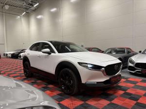 White Mazda CX-30 2020 in Vilnius, with an engine capacity of 2.49 L and mileage of 35 thousand km for 17800 €, photo 4 on AUTOMOTO.COM.LV