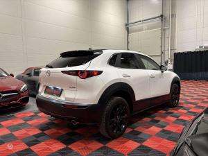 White Mazda CX-30 2020 in Vilnius, with an engine capacity of 2.49 L and mileage of 35 thousand km for 17800 €, photo 5 on AUTOMOTO.COM.LV