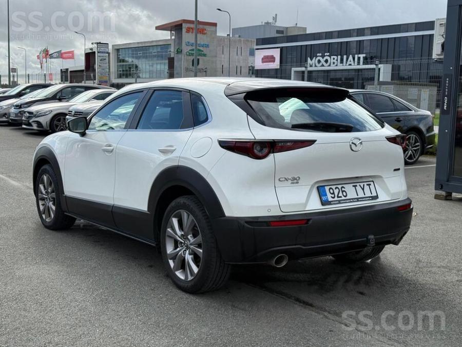 White Mazda CX-30 2020 in Tallinn, with an engine capacity of 2.00 L and mileage of 106 thousand km for 19490 €, photo 3 on AUTOMOTO.COM.LV