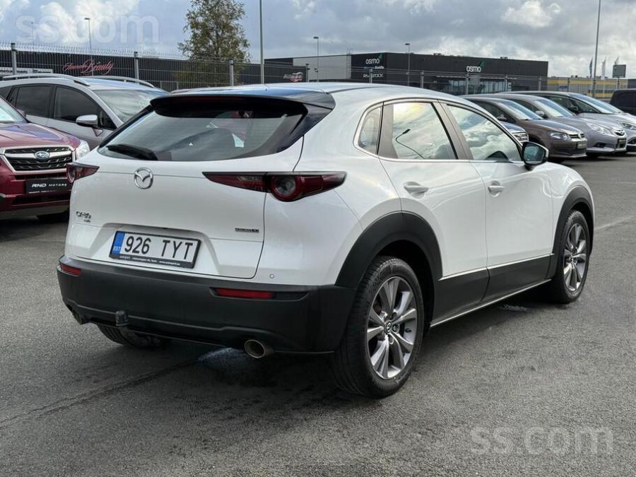 White Mazda CX-30 2020 in Tallinn, with an engine capacity of 2.00 L and mileage of 106 thousand km for 19490 €, photo 4 on AUTOMOTO.COM.LV