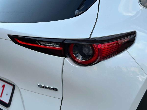 White Mazda CX-30 2021 in Kaunas, with an engine capacity of 2.00 L and mileage of 76 thousand km for 20200 €, photo 8 on AUTOMOTO.COM.LV