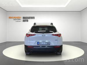 Белый Мазда CX-30 2021 в Рига, объемом двигателя 2.00 л и пробегом 140 тыс. км за 16990 €, фото 6 на AUTOMOTO.COM.LV