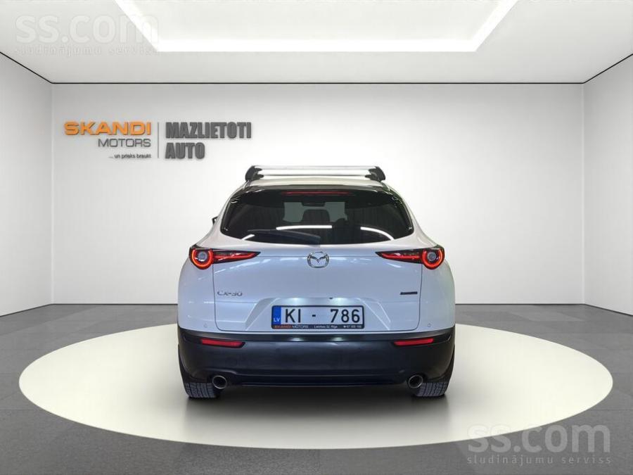 Белый Мазда CX-30 2021 в Рига, объемом двигателя 2.00 л и пробегом 140 тыс. км за 16990 €, фото 6 на AUTOMOTO.COM.LV