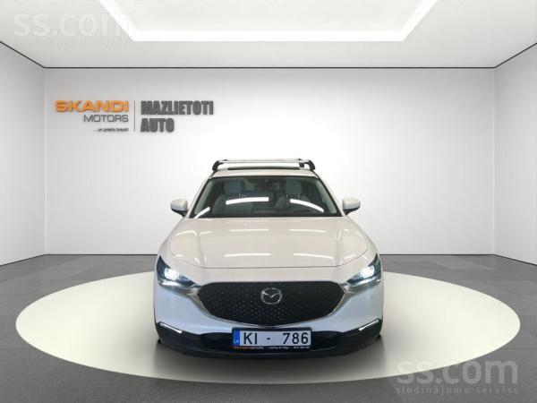 White Mazda CX-30 2021 in Riga, with an engine capacity of 2.00 L and mileage of 140 thousand km for 16990 €, photo 3 on AUTOMOTO.COM.LV