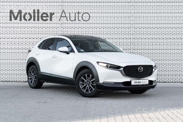 Белый Мазда CX-30 2022 в Рига, объемом двигателя 2.00 л и пробегом 54 тыс. км за 20200 €, фото 2 на AUTOMOTO.COM.LV