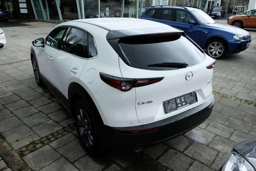 Белый Мазда CX-30 2023 в Каунас, объемом двигателя 2.00 л и пробегом 54 тыс. км за 28055 €, фото 3 на AUTOMOTO.COM.LV