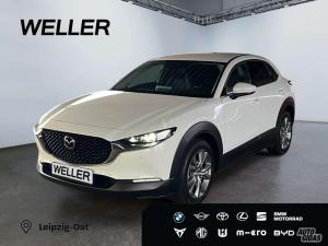 White Mazda CX-30 2023 in Kaunas, with an engine capacity of 2.00 L and mileage of 14 thousand km for 26510 €, photo  on AUTOMOTO.COM.LV