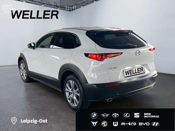 White Mazda CX-30 2023 in Kaunas, with an engine capacity of 2.00 L and mileage of 14 thousand km for 26510 €, photo 7 on AUTOMOTO.COM.LV