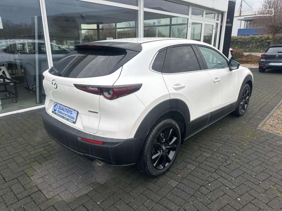 Белый Мазда CX-30 2024 в Каунас, объемом двигателя 2.00 л и пробегом 33 тыс. км за 26820 €, фото 4 на AUTOMOTO.COM.LV