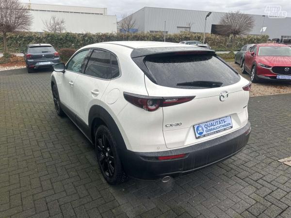 White Mazda CX-30 2024 in Kaunas, with an engine capacity of 2.00 L and mileage of 33 thousand km for 26820 €, photo 5 on AUTOMOTO.COM.LV