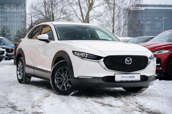 White Mazda CX-30 2020 in Riga, with an engine capacity of 2.00 L and mileage of 49 thousand km for 19490 €, photo 3 on AUTOMOTO.COM.LV
