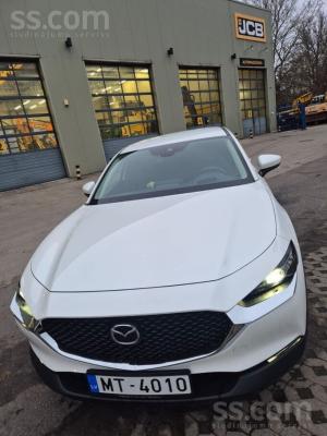 Balts Mazda CX-30 2021 Rīga, ar dzinēja tilpumu 2.00 L un nobraukumu 30 tūkst. km par 18500 €, foto  vietnē AUTOMOTO.COM.LV