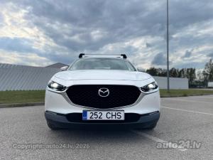 White Mazda CX-30 2021 in Tallinn, with an engine capacity of 2.00 L and mileage of 65 thousand km for 22880 €, photo 5 on AUTOMOTO.COM.LV