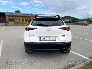 White Mazda CX-30 2021 in Tallinn, with an engine capacity of 2.00 L and mileage of 65 thousand km for 22880 €, photo 6 on AUTOMOTO.COM.LV