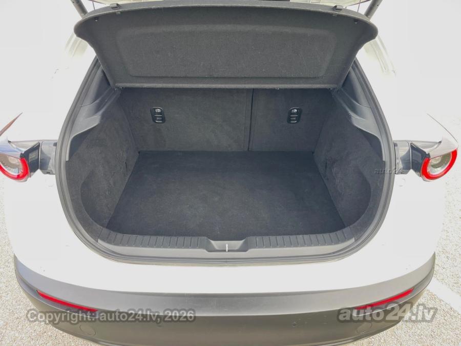 White Mazda CX-30 2021 in Tallinn, with an engine capacity of 2.00 L and mileage of 65 thousand km for 22880 €, photo 12 on AUTOMOTO.COM.LV
