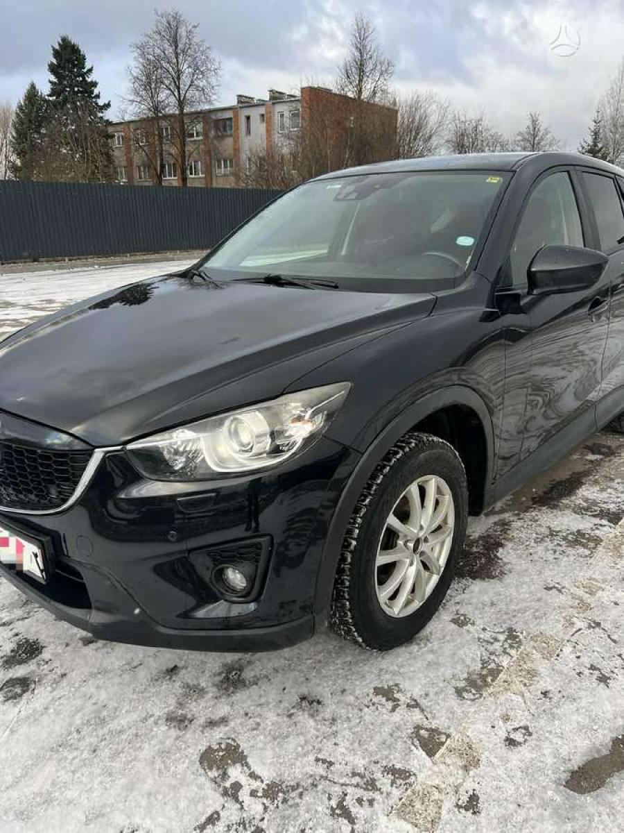 Black Mazda CX-5 2012 in Kaunas, with an engine capacity of 2.19 L and mileage of 212 thousand km for 6400 €, photo 1 on AUTOMOTO.COM.LV