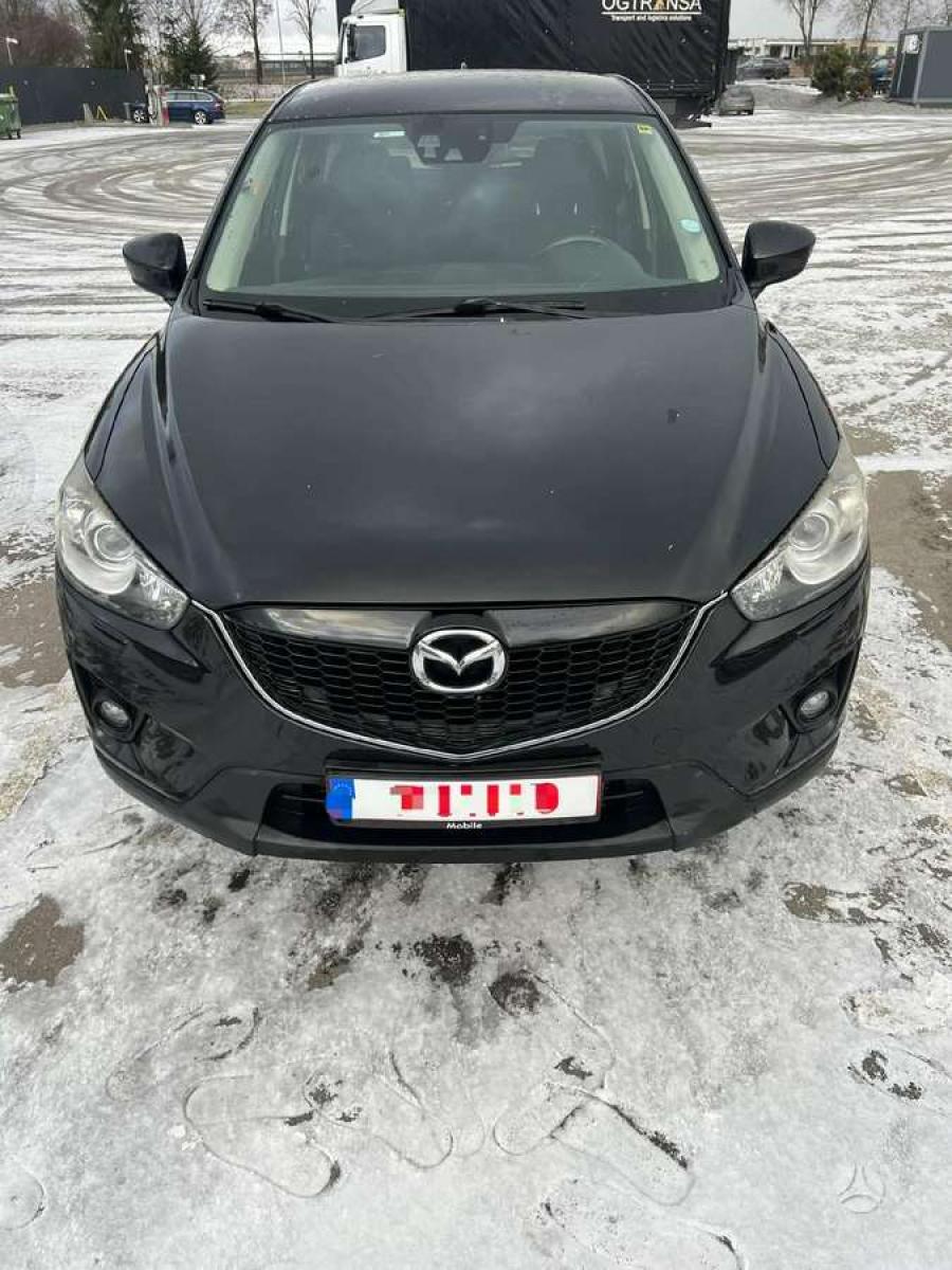 Black Mazda CX-5 2012 in Kaunas, with an engine capacity of 2.19 L and mileage of 212 thousand km for 6400 €, photo 2 on AUTOMOTO.COM.LV