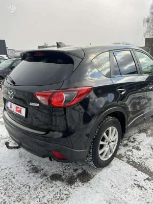 Black Mazda CX-5 2012 in Kaunas, with an engine capacity of 2.19 L and mileage of 212 thousand km for 6400 €, photo 4 on AUTOMOTO.COM.LV