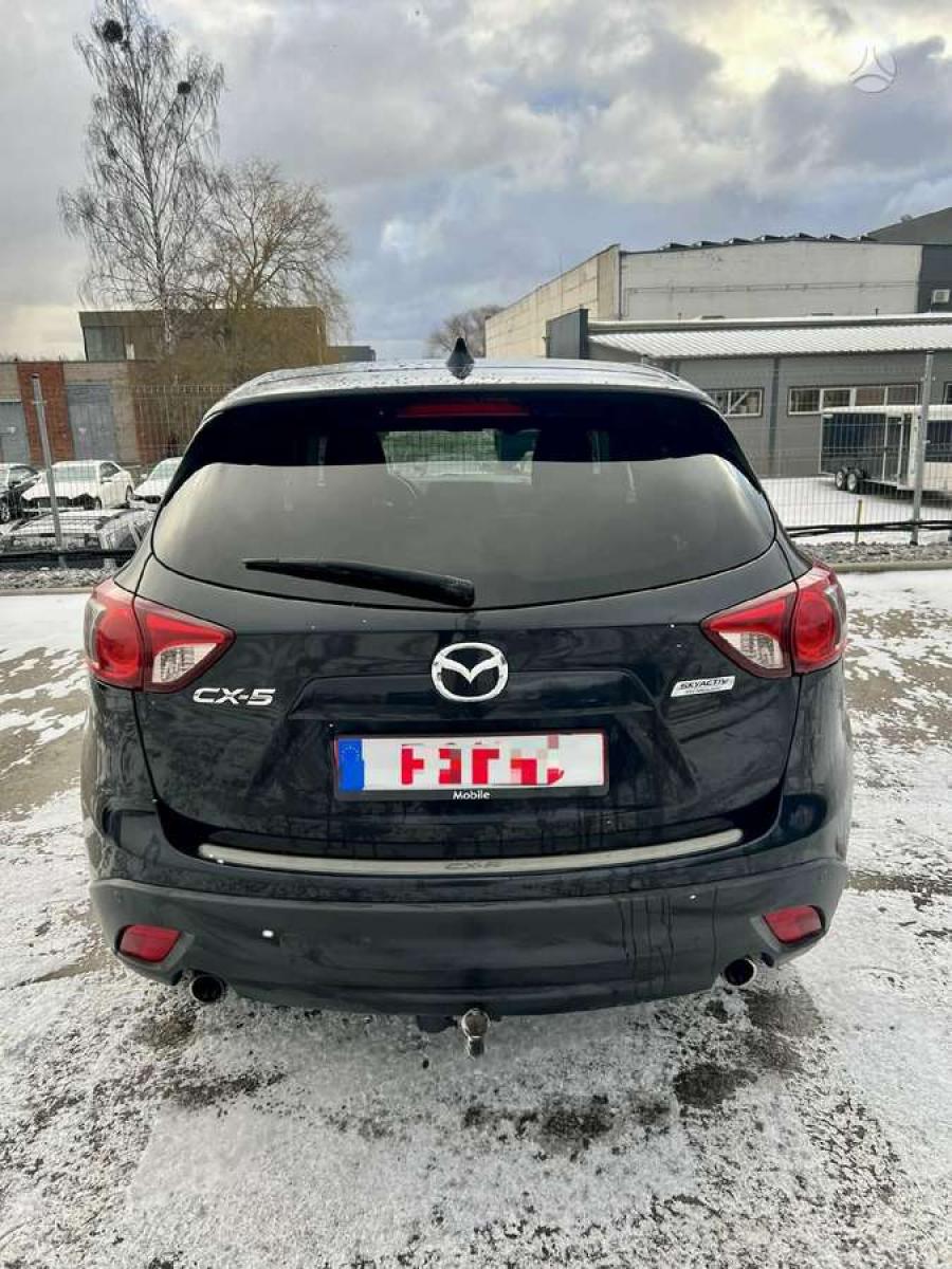 Black Mazda CX-5 2012 in Kaunas, with an engine capacity of 2.19 L and mileage of 212 thousand km for 6400 €, photo 5 on AUTOMOTO.COM.LV