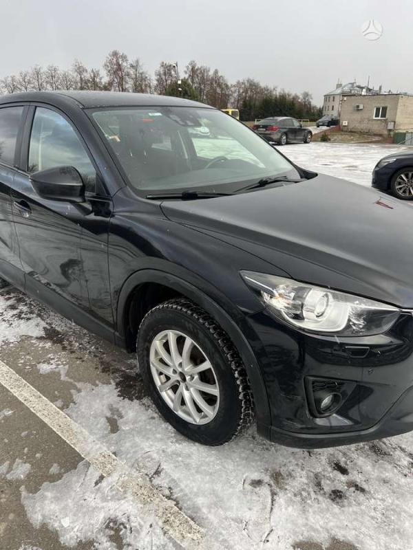 Melns Mazda CX-5 2012 Kauņa, ar dzinēja tilpumu 2.19 L un nobraukumu 212 tūkst. km par 6400 €, foto 8 vietnē AUTOMOTO.COM.LV