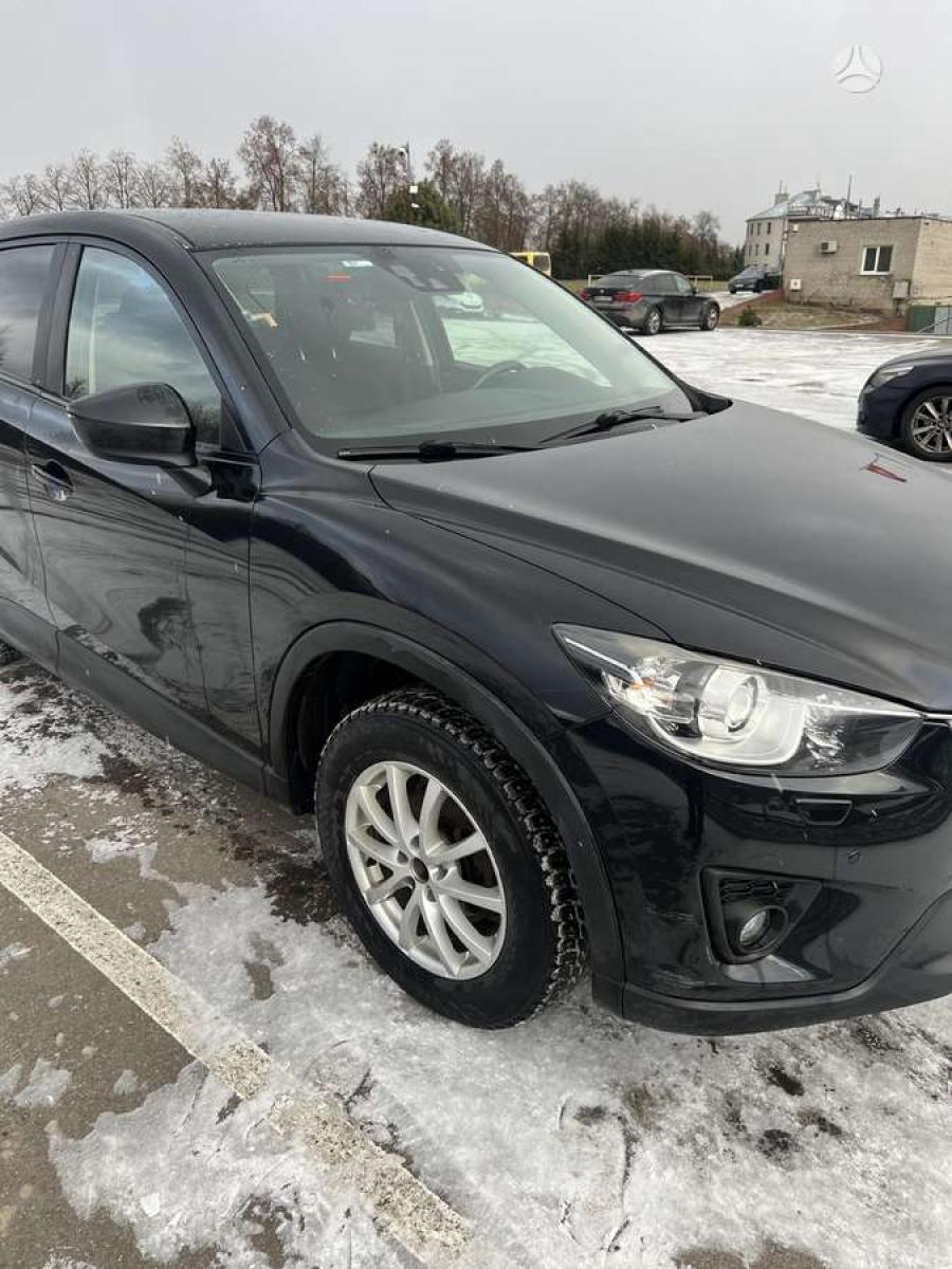 Black Mazda CX-5 2012 in Kaunas, with an engine capacity of 2.19 L and mileage of 212 thousand km for 6400 €, photo 8 on AUTOMOTO.COM.LV
