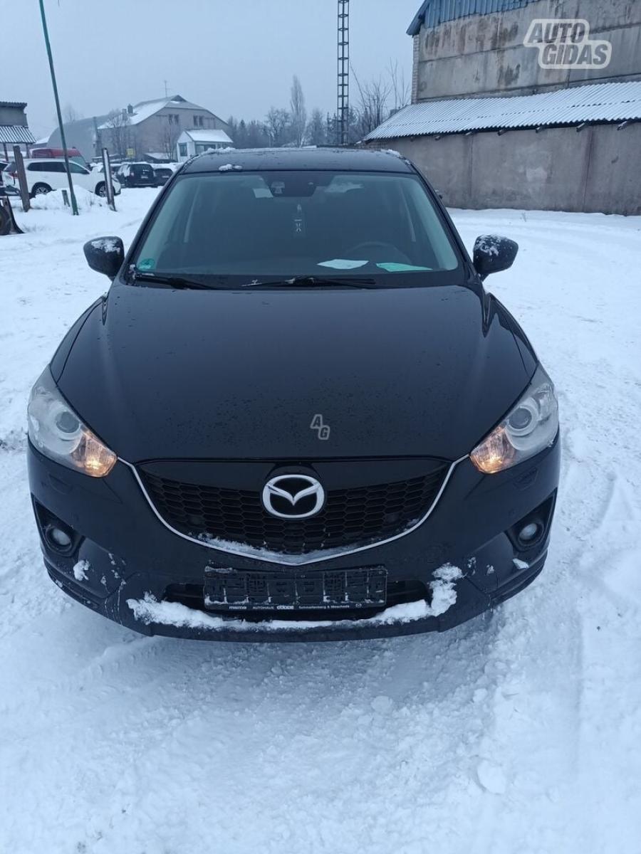 Melns Mazda CX-5 2012 Tauragė, ar dzinēja tilpumu 2.20 L un nobraukumu 272 tūkst. km par 5800 €, foto 1 vietnē AUTOMOTO.COM.LV