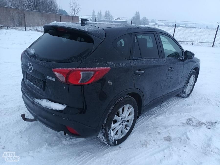 Melns Mazda CX-5 2012 Tauragė, ar dzinēja tilpumu 2.20 L un nobraukumu 272 tūkst. km par 5800 €, foto 5 vietnē AUTOMOTO.COM.LV