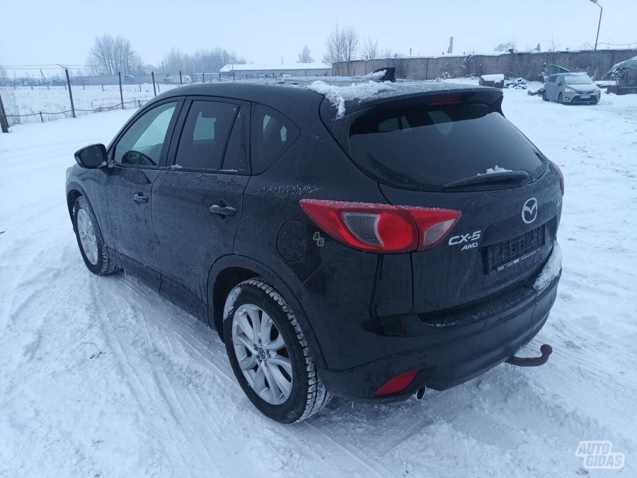 Melns Mazda CX-5 2012 Tauragė, ar dzinēja tilpumu 2.20 L un nobraukumu 272 tūkst. km par 5800 €, foto 7 vietnē AUTOMOTO.COM.LV