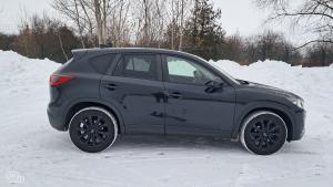 Black Mazda CX-5 2012 in Klaipeda, with an engine capacity of 2.20 L and mileage of 213 thousand km for 6930 €, photo 4 on AUTOMOTO.COM.LV