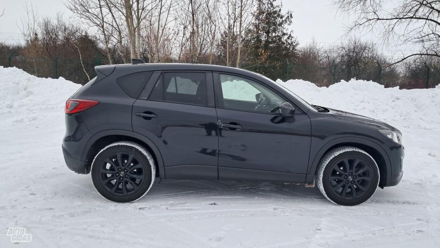 Black Mazda CX-5 2012 in Klaipeda, with an engine capacity of 2.20 L and mileage of 213 thousand km for 6930 €, photo 4 on AUTOMOTO.COM.LV