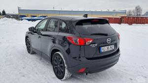 Black Mazda CX-5 2012 in Klaipeda, with an engine capacity of 2.20 L and mileage of 213 thousand km for 6930 €, photo 5 on AUTOMOTO.COM.LV