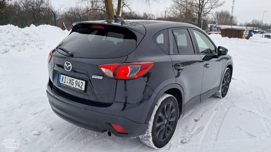 Black Mazda CX-5 2012 in Klaipeda, with an engine capacity of 2.20 L and mileage of 213 thousand km for 6930 €, photo 6 on AUTOMOTO.COM.LV