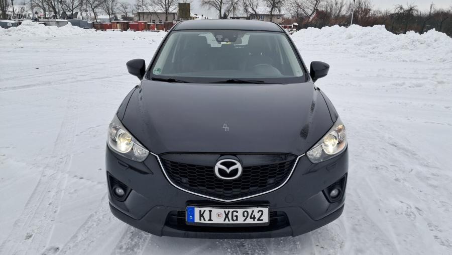Black Mazda CX-5 2012 in Klaipeda, with an engine capacity of 2.20 L and mileage of 213 thousand km for 6930 €, photo 7 on AUTOMOTO.COM.LV