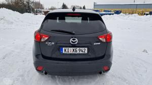 Black Mazda CX-5 2012 in Klaipeda, with an engine capacity of 2.20 L and mileage of 213 thousand km for 6930 €, photo 8 on AUTOMOTO.COM.LV