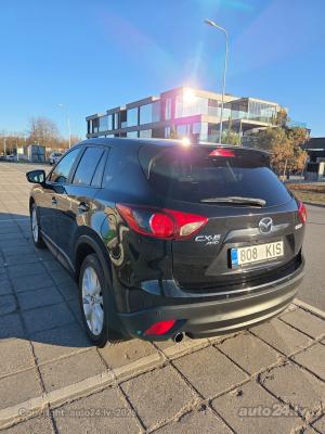 Melns Mazda CX-5 2012 Tallina, ar dzinēja tilpumu 2.00 L un nobraukumu 130 tūkst. km par 10500 €, foto 4 vietnē AUTOMOTO.COM.LV