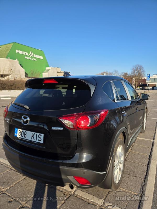 Melns Mazda CX-5 2012 Tallina, ar dzinēja tilpumu 2.00 L un nobraukumu 130 tūkst. km par 10500 €, foto 4 vietnē AUTOMOTO.COM.LV
