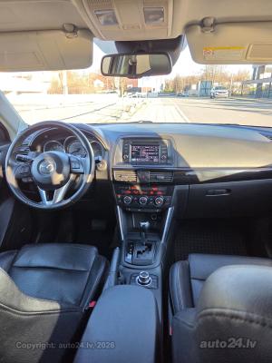 Melns Mazda CX-5 2012 Tallina, ar dzinēja tilpumu 2.00 L un nobraukumu 130 tūkst. km par 10500 €, foto 10 vietnē AUTOMOTO.COM.LV