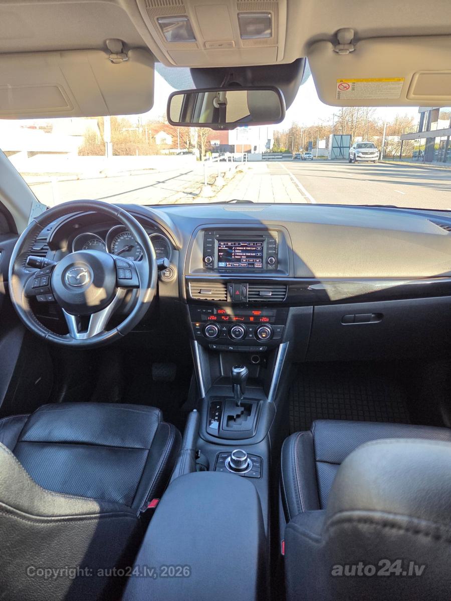 Melns Mazda CX-5 2012 Tallina, ar dzinēja tilpumu 2.00 L un nobraukumu 130 tūkst. km par 10500 €, foto 10 vietnē AUTOMOTO.COM.LV