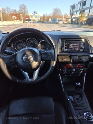 Melns Mazda CX-5 2012 Tallina, ar dzinēja tilpumu 2.00 L un nobraukumu 130 tūkst. km par 10500 €, foto 12 vietnē AUTOMOTO.COM.LV