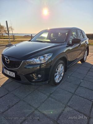 Melns Mazda CX-5 2012 Tallina, ar dzinēja tilpumu 2.00 L un nobraukumu 130 tūkst. km par 10500 €, foto 14 vietnē AUTOMOTO.COM.LV