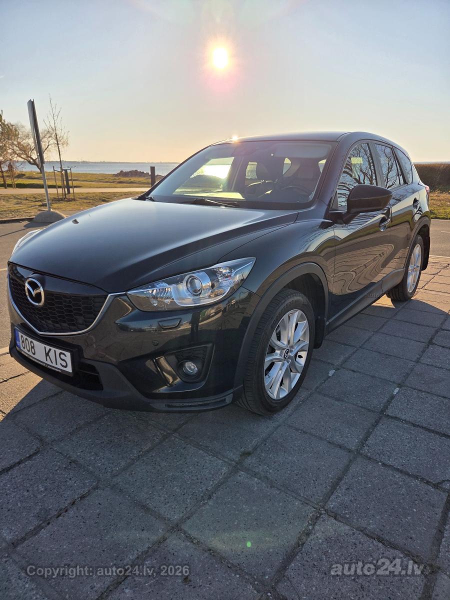 Melns Mazda CX-5 2012 Tallina, ar dzinēja tilpumu 2.00 L un nobraukumu 130 tūkst. km par 10500 €, foto 14 vietnē AUTOMOTO.COM.LV