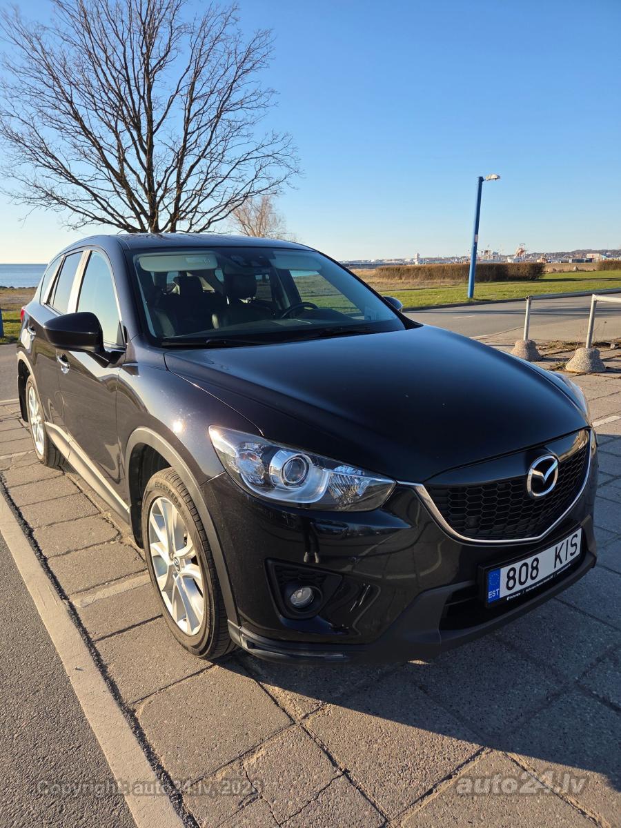 Melns Mazda CX-5 2012 Tallina, ar dzinēja tilpumu 2.00 L un nobraukumu 130 tūkst. km par 10500 €, foto 15 vietnē AUTOMOTO.COM.LV