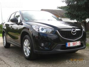 Melns Mazda CX-5 2012 Jēkabpils, ar dzinēja tilpumu 2.20 L un nobraukumu 233 tūkst. km par 6499 €, foto  vietnē AUTOMOTO.COM.LV