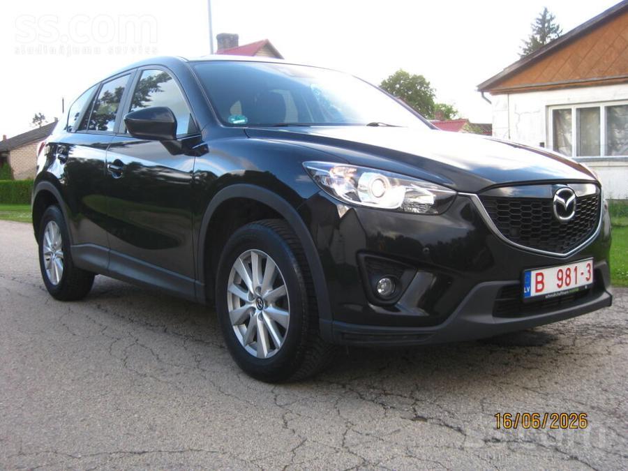 Black Mazda CX-5 2012 in Jekabpils, with an engine capacity of 2.20 L and mileage of 233 thousand km for 6499 €, photo 7 on AUTOMOTO.COM.LV